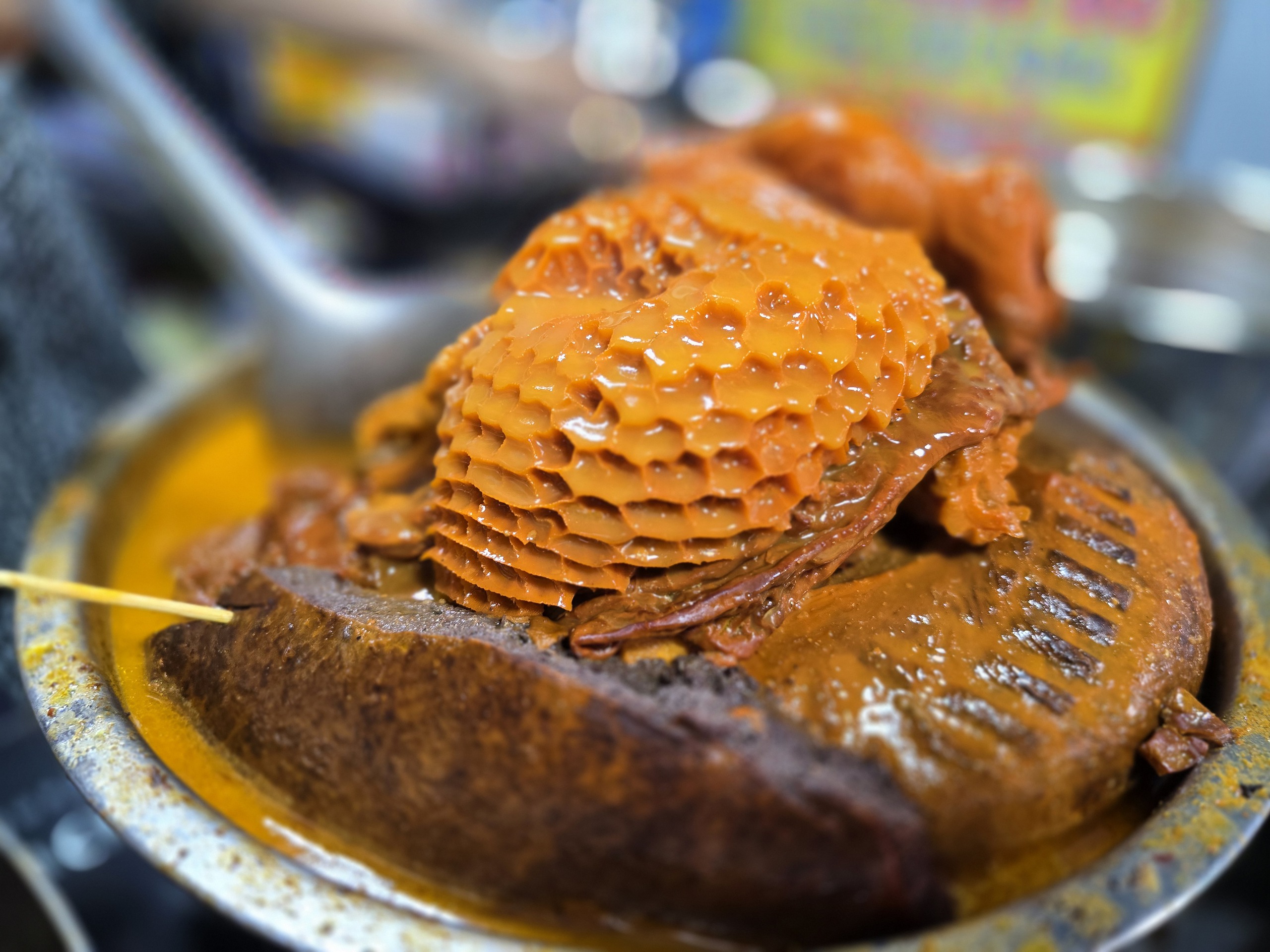 The beef offal stall is crowded despite being located deep in a small ...